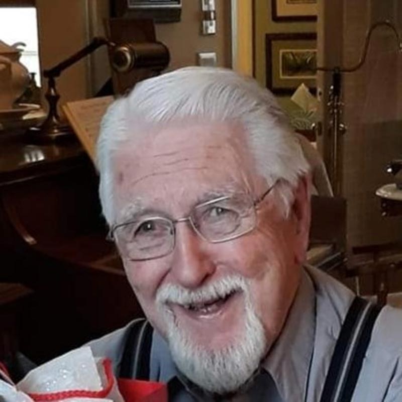 Raymond Douglas SIMMONS - The Times Examiner